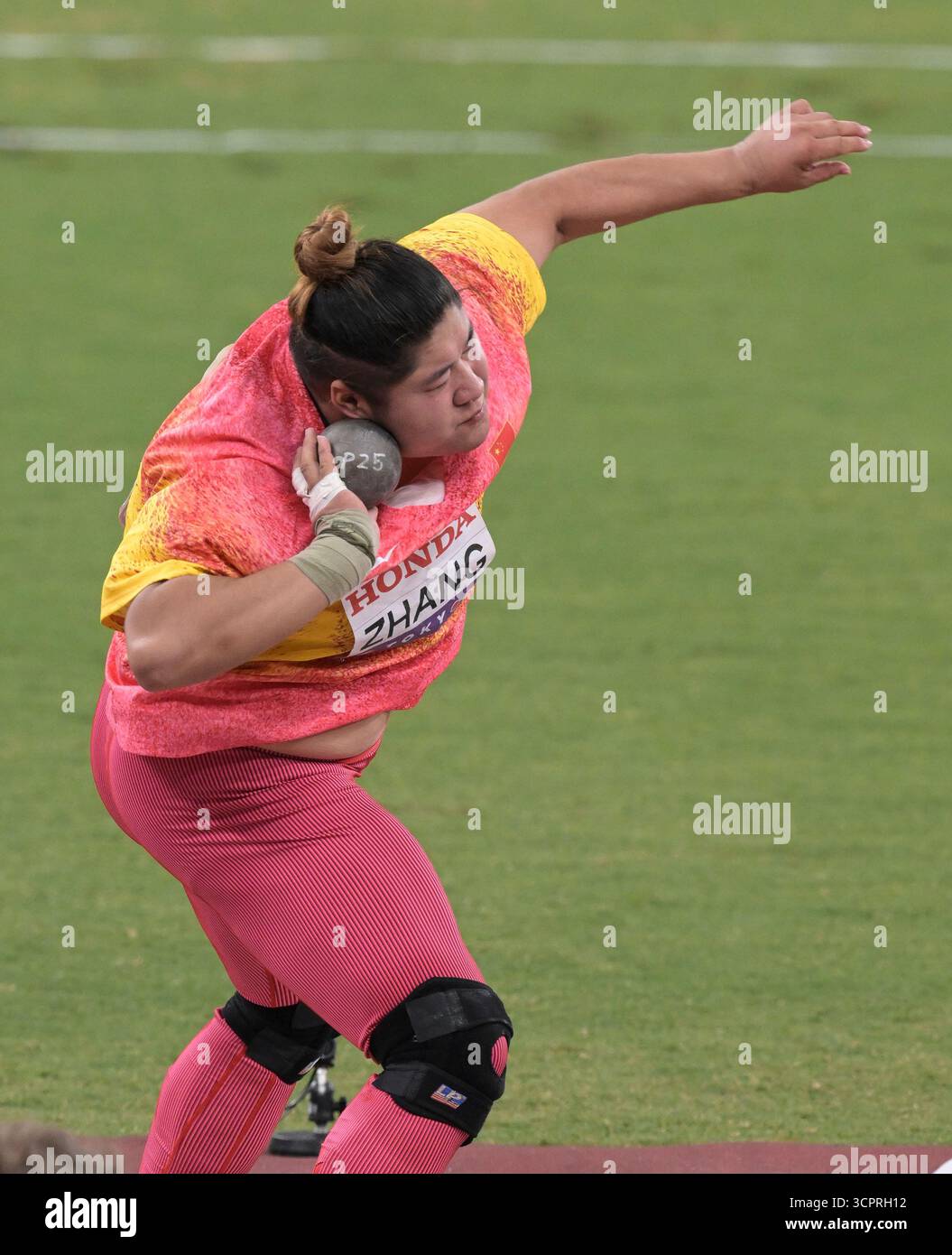 Linru Zhang of China competing in the women’s shot put at the World ...