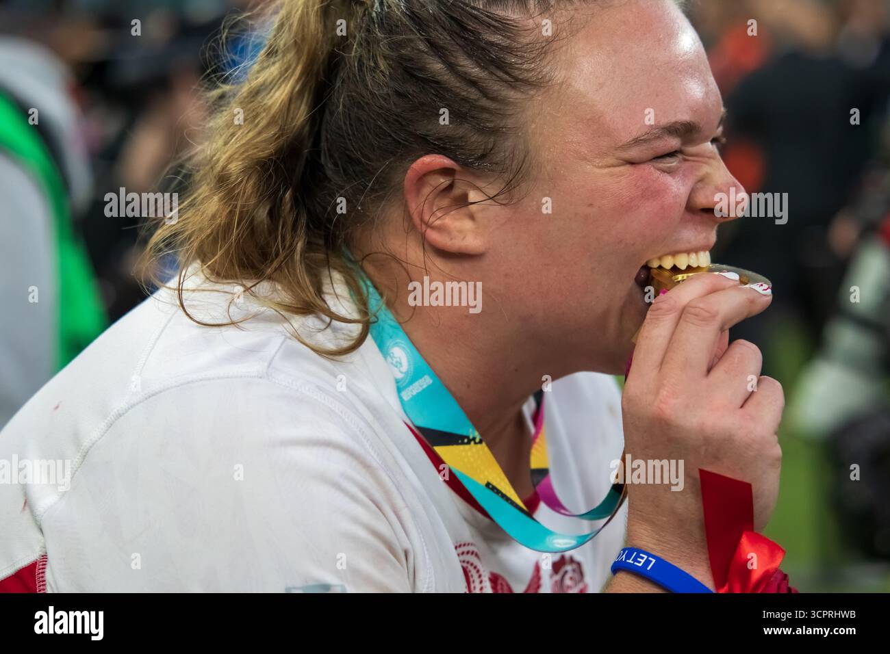 London, UK, 27th September 2025 England player Sarah Bern bites into ...