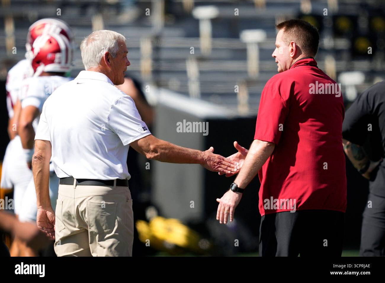 Iowa head coach Kirk Ferentz, left, greets Indiana head coach Curt ...