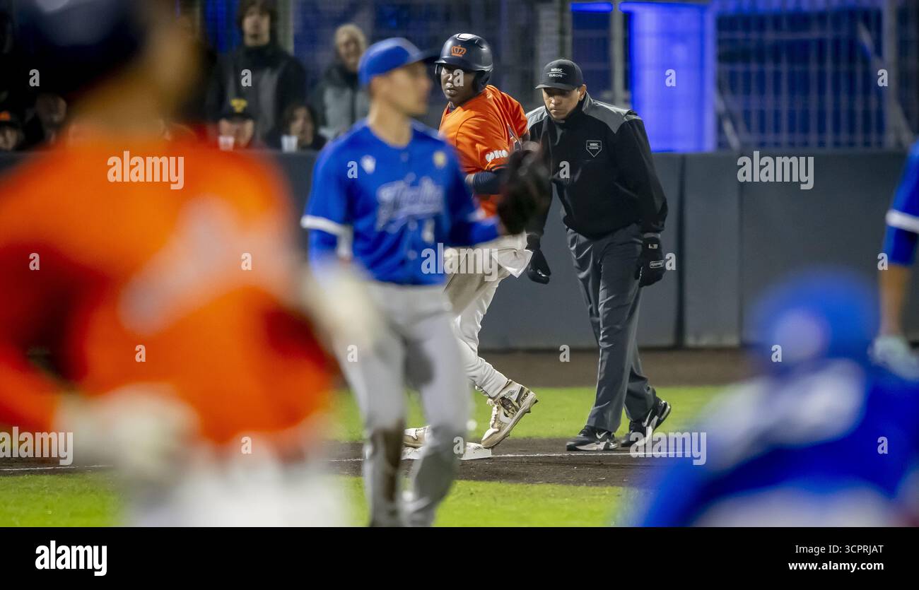ROTTERDAM - Dutch baseball player PROFAR Juremi in action against Italy ...