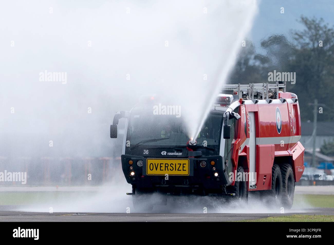 Sydney, Australia. 27th Sep, 2025. A Rosenbauer RAAF Fire Truck sprays ...