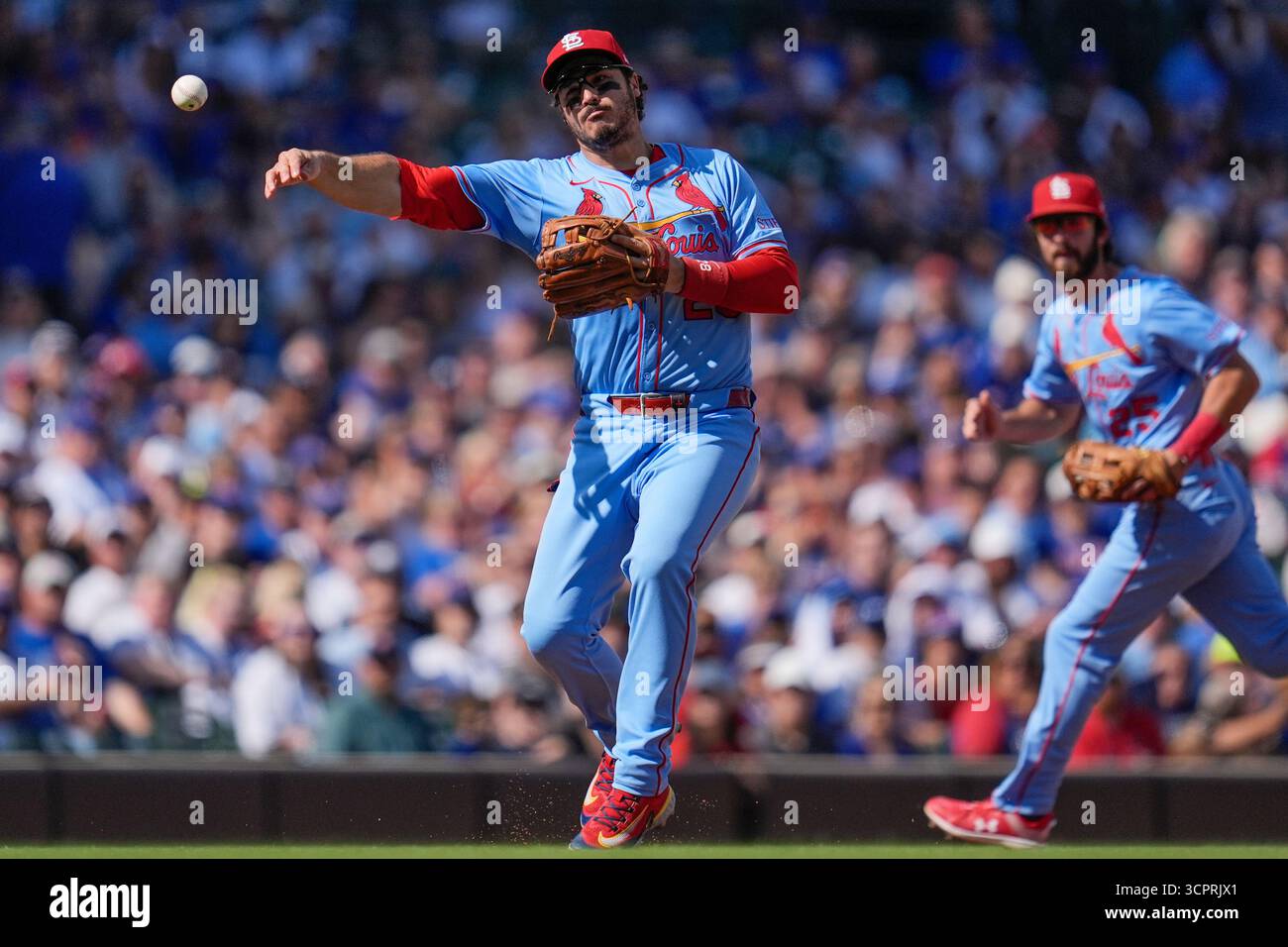 St. Louis Cardinals third baseman Nolan Arenado (28) throws out Chicago ...
