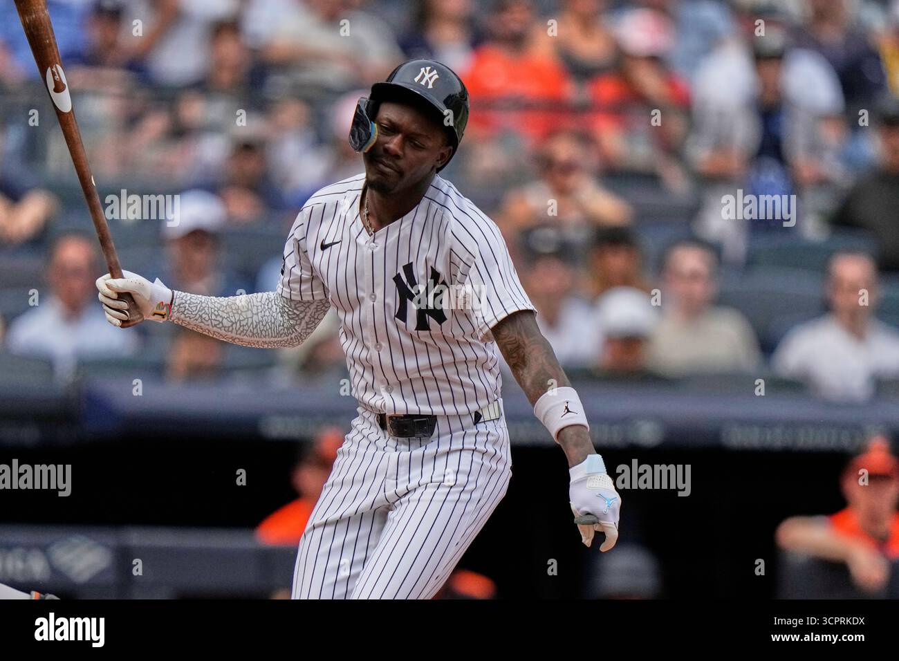 New York Yankees' Jazz Chisholm Jr. reacts after he is hit with a pitch ...