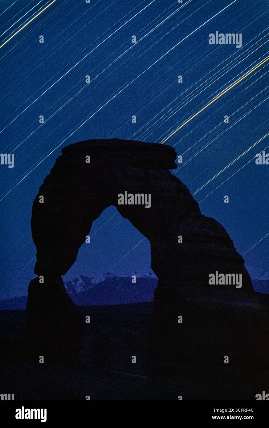Star trails over Delicate Arch and the La Sal Mountains, Arches ...