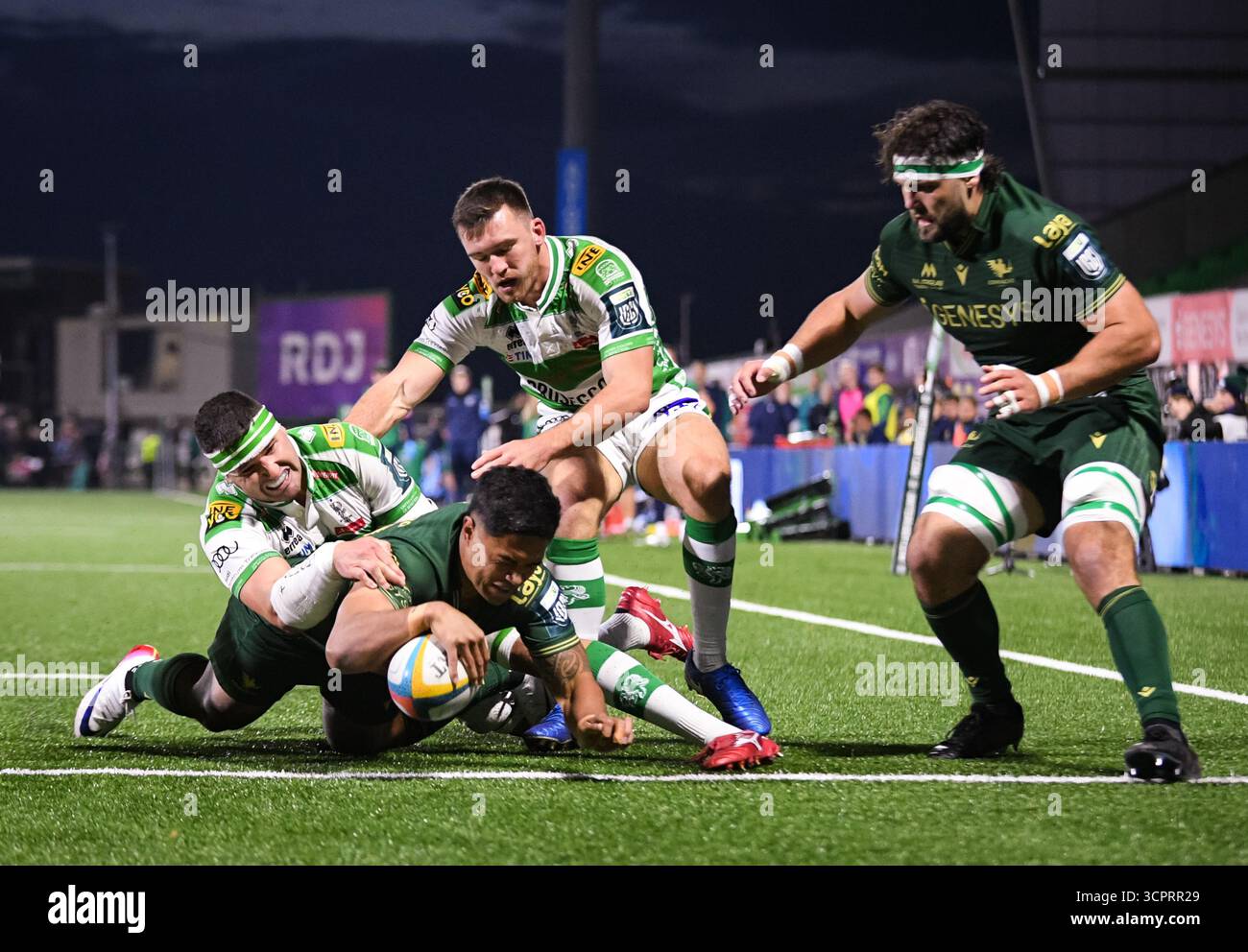 Galway, Ireland. 27th September, 2025. Connacht's Josh Ioane scores a ...