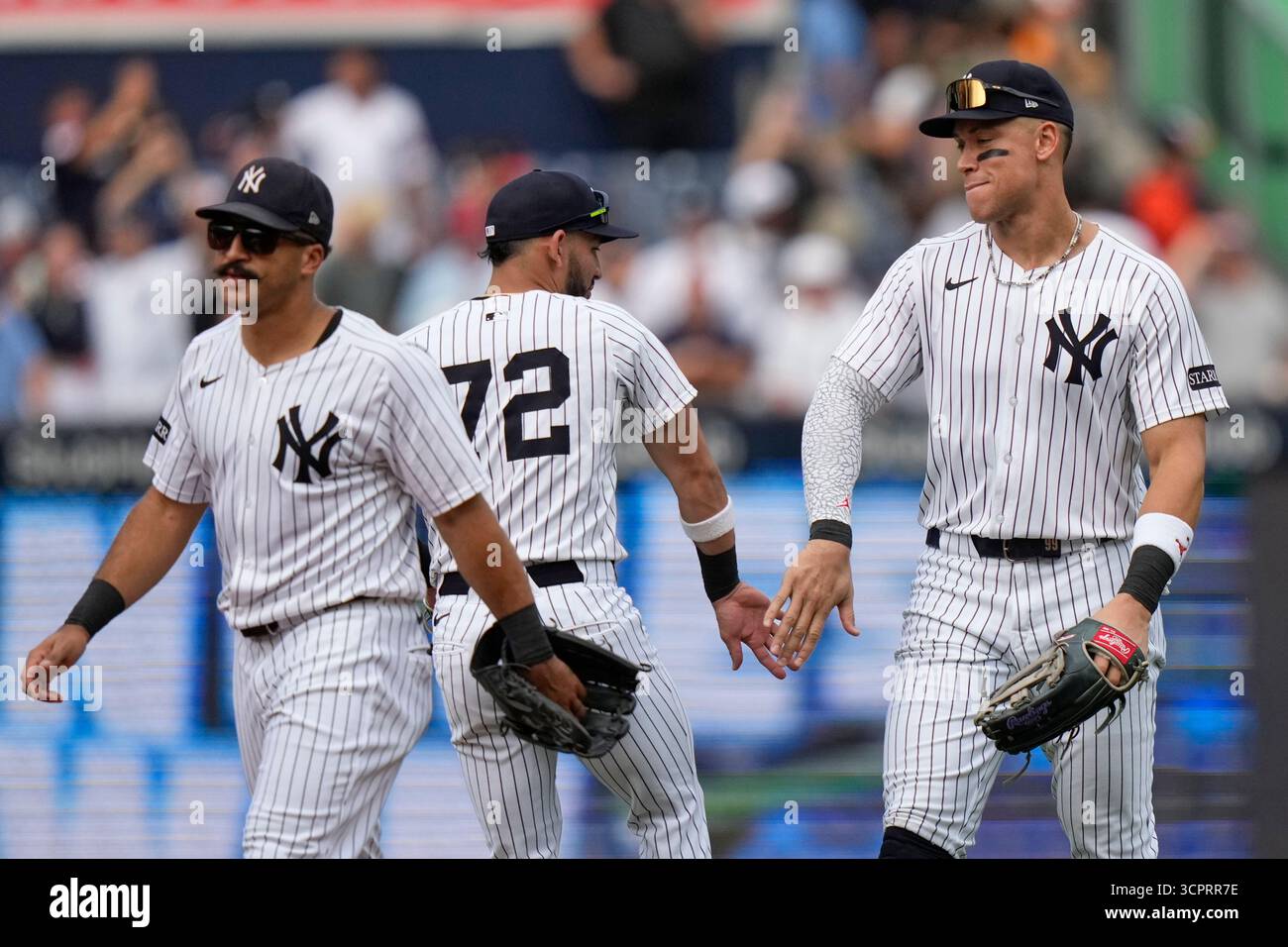New York Yankees' Aaron Judge, right, celebrates with teammates José ...