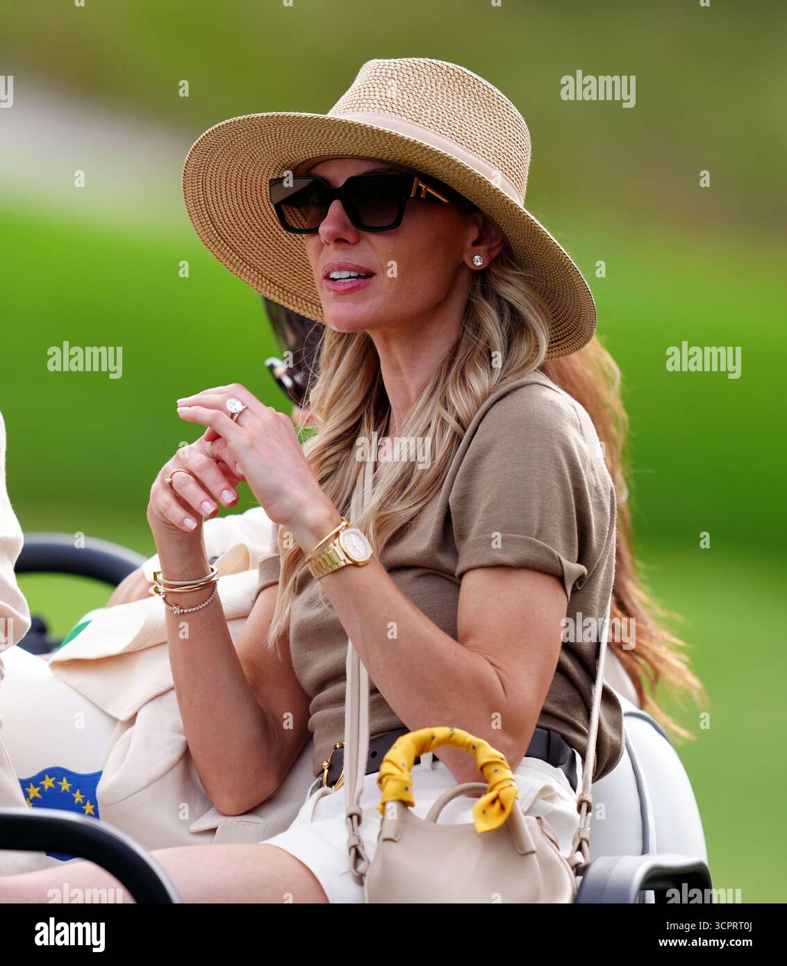 Erica Stoll, wife of Rory McIlroy watching the afternoon fourball ...