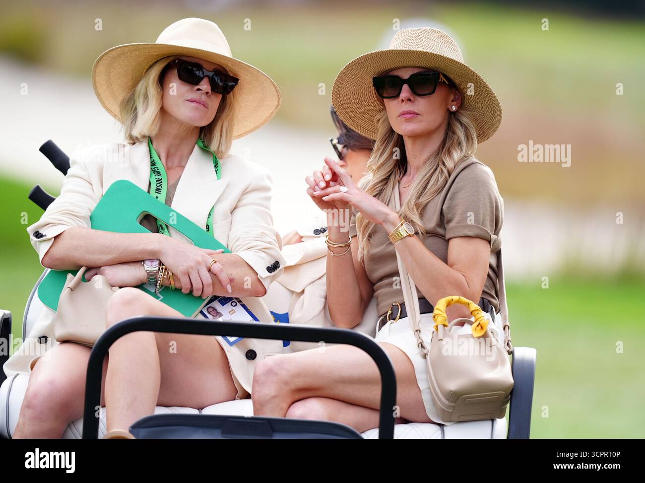 Erica Stoll, wife of Rory McIlroy with Wendy Lowry, wife of Shane Lowry watching the afternoon ...