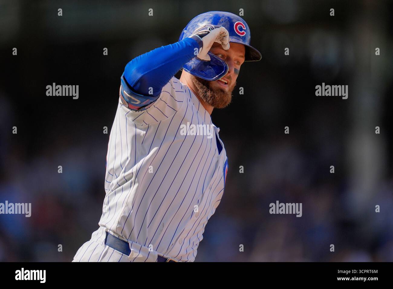 Chicago Cubs' Michael Busch (29) runs the bases after hitting a two-run ...