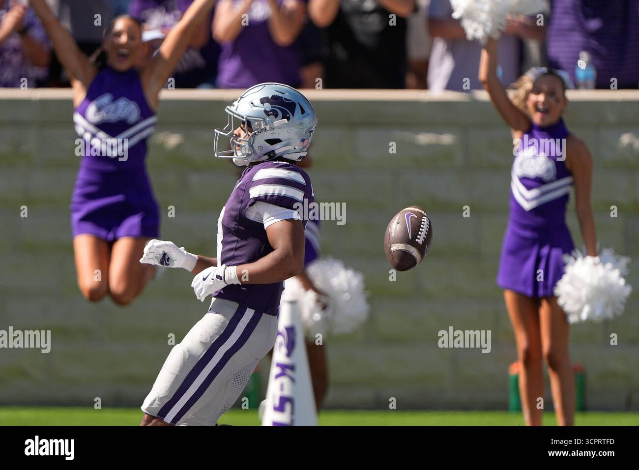Kansas State running back Dylan Edwards runs into the end zone to score ...