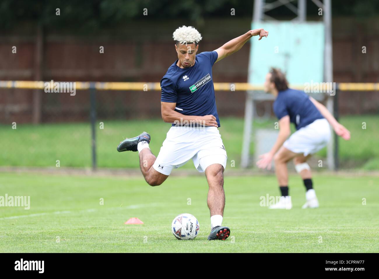 Lyle Taylor, of Chelmsford City, warming up before the match between ...