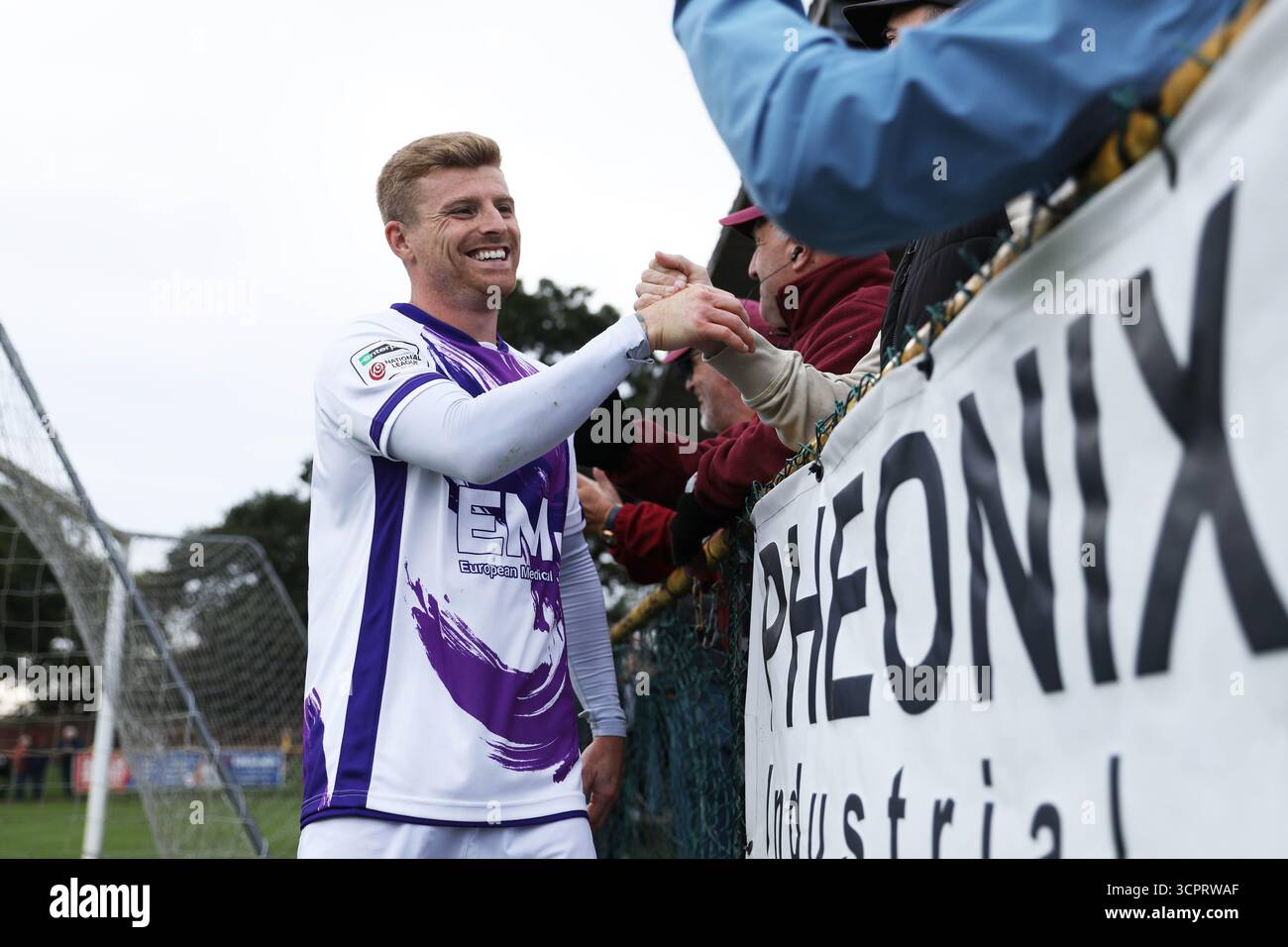 Jack Barham, of Chelmsford City, interacts with fans after the match ...
