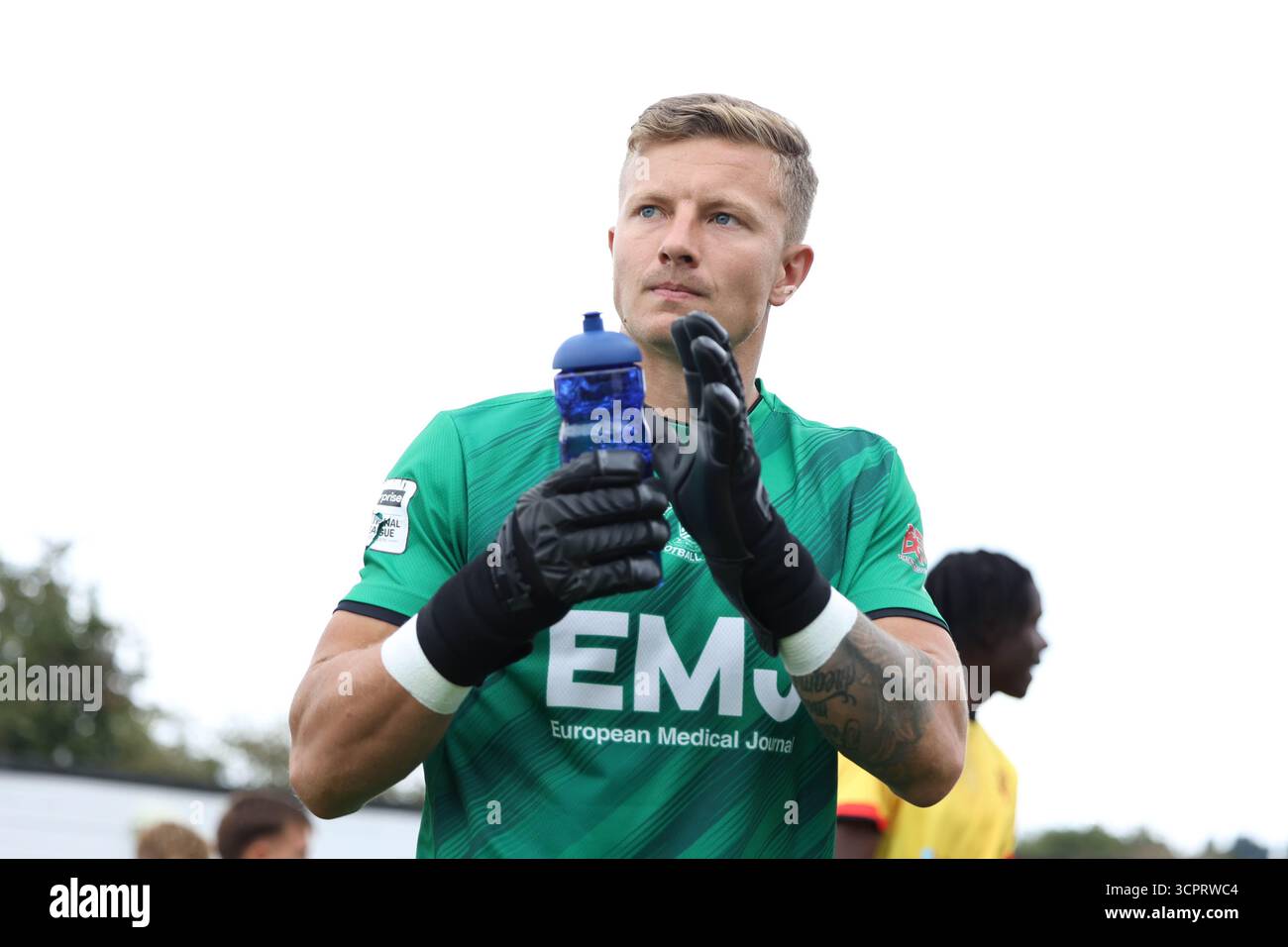 Chris Haigh, of Chelmsford City, walking into the pitch for the match ...
