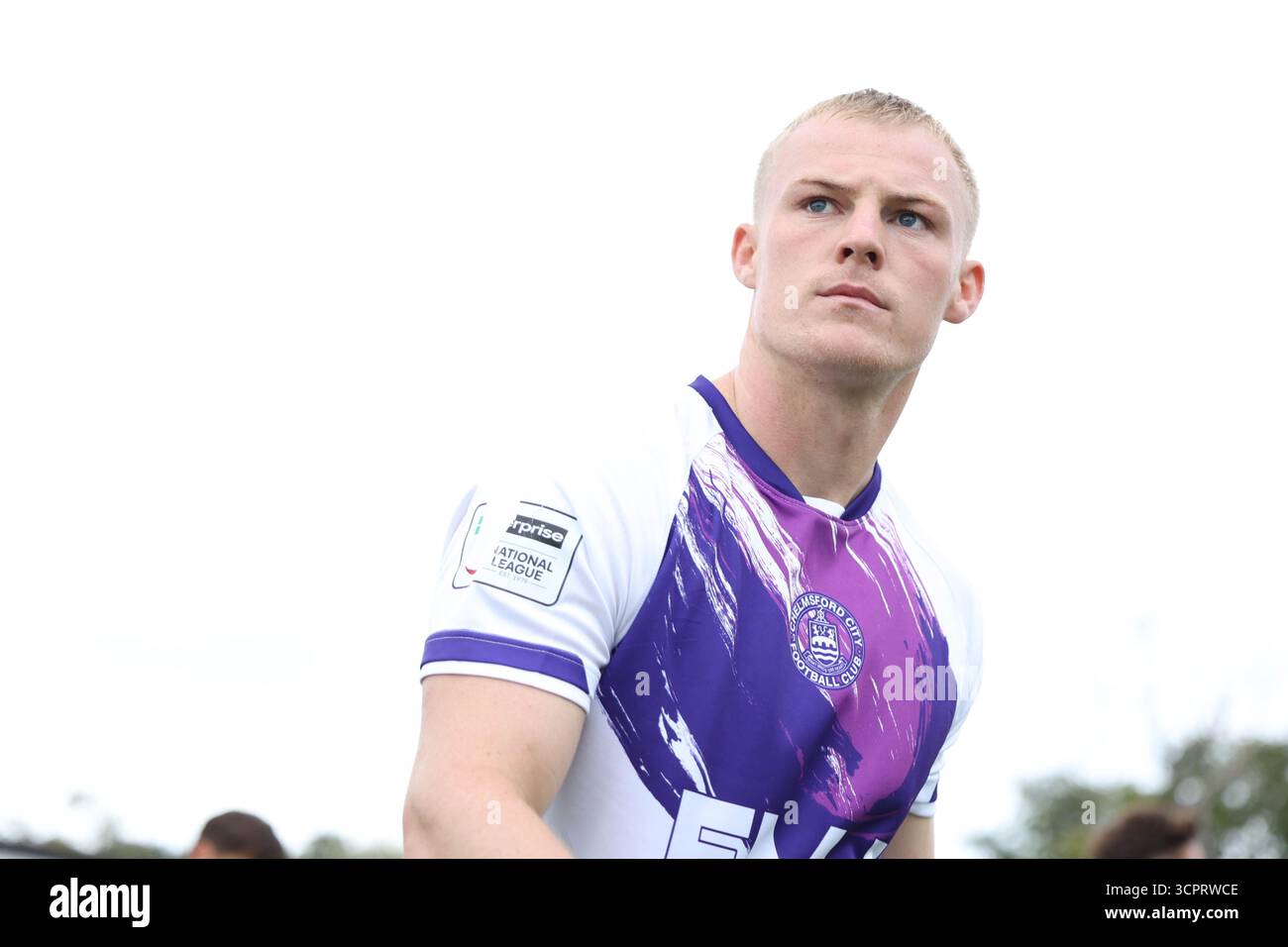 Ben Tompkins, of Chelmsford City, walking into the pitch for the match ...