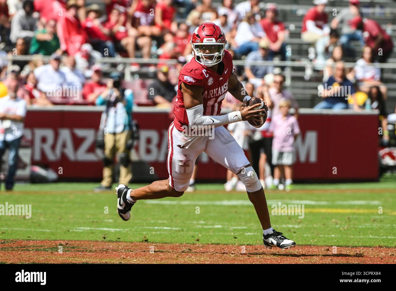 Arkansas quarterback Taylen Green (10) runs the ball against Notre Dame ...