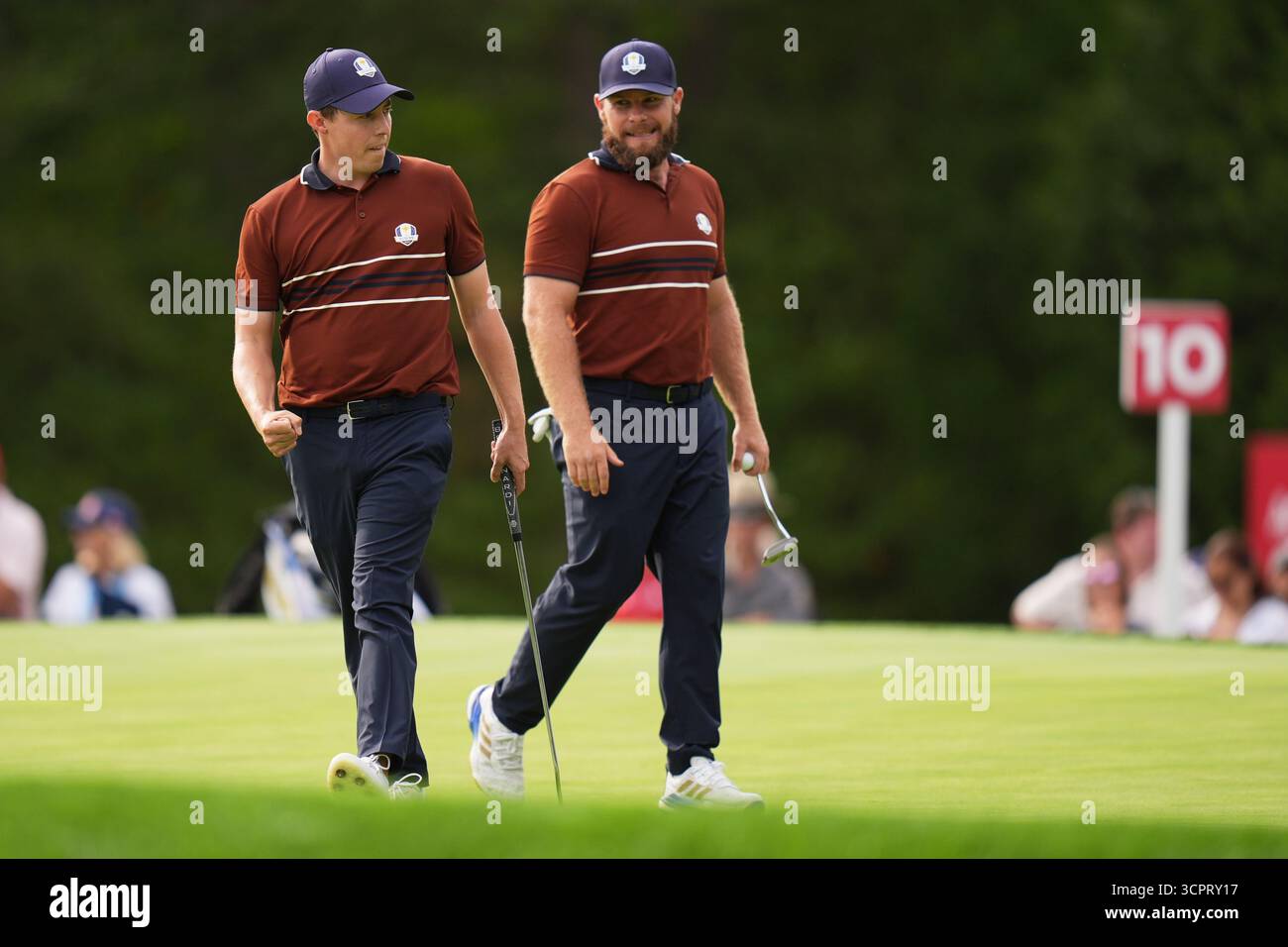 Europe's Matthew Fitzpatrick celebrates after a putt on the 10th hole ...