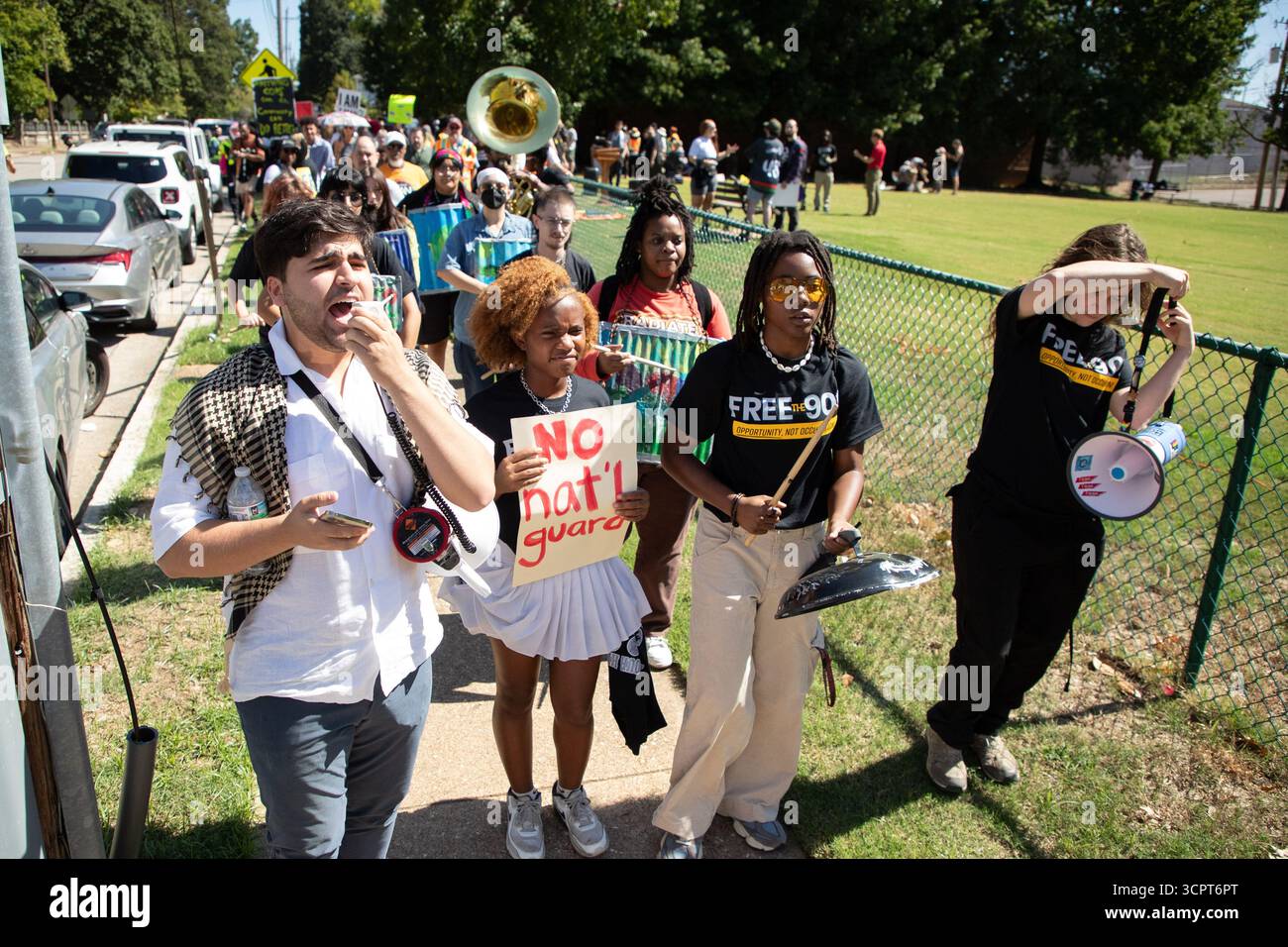 People march in Memphis, Tenn., Saturday, Sept. 27, 2025, to protest ...