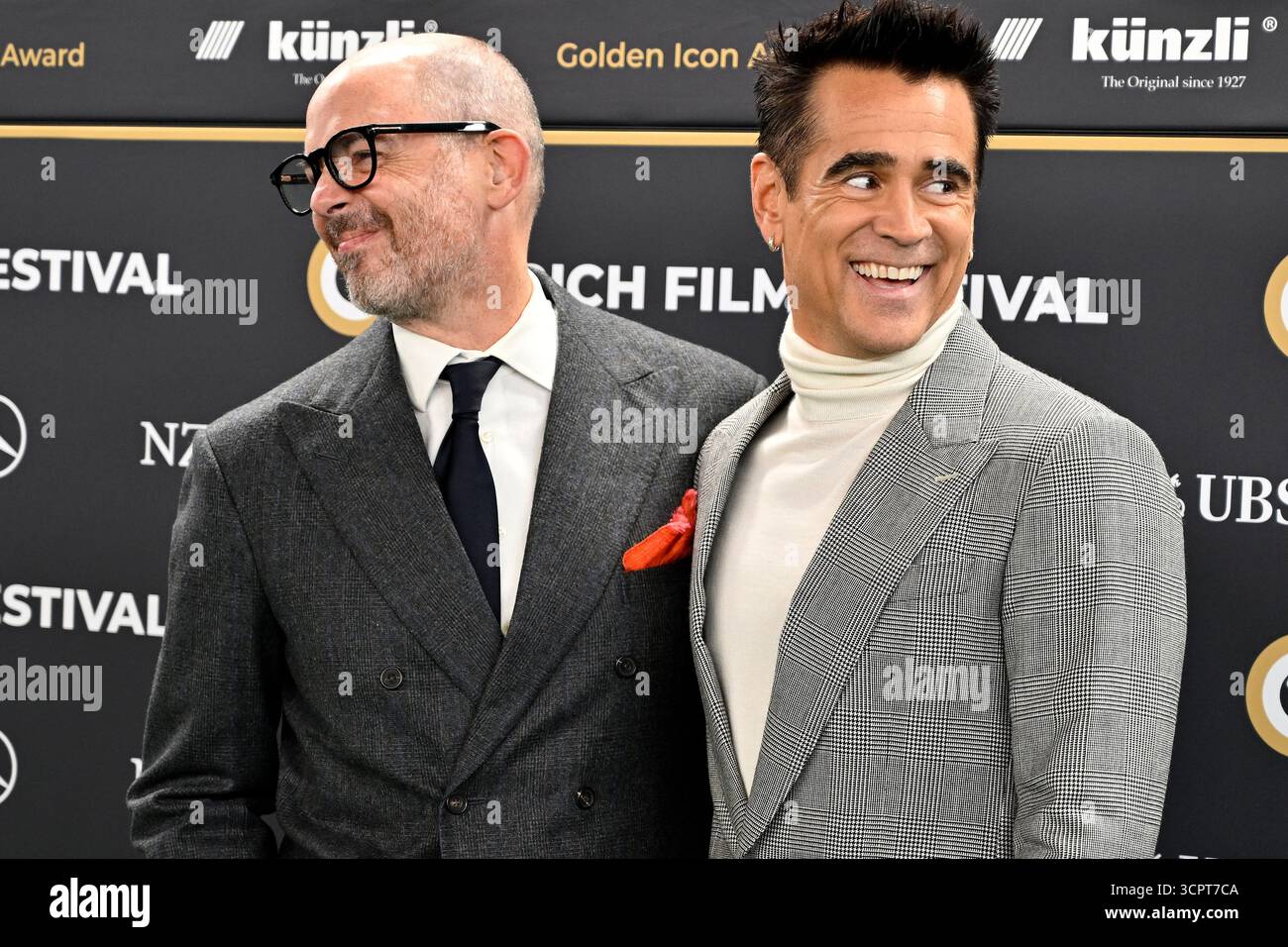 Swiss-Austrian film director Edward Berger, left, and Irish actor Colin ...
