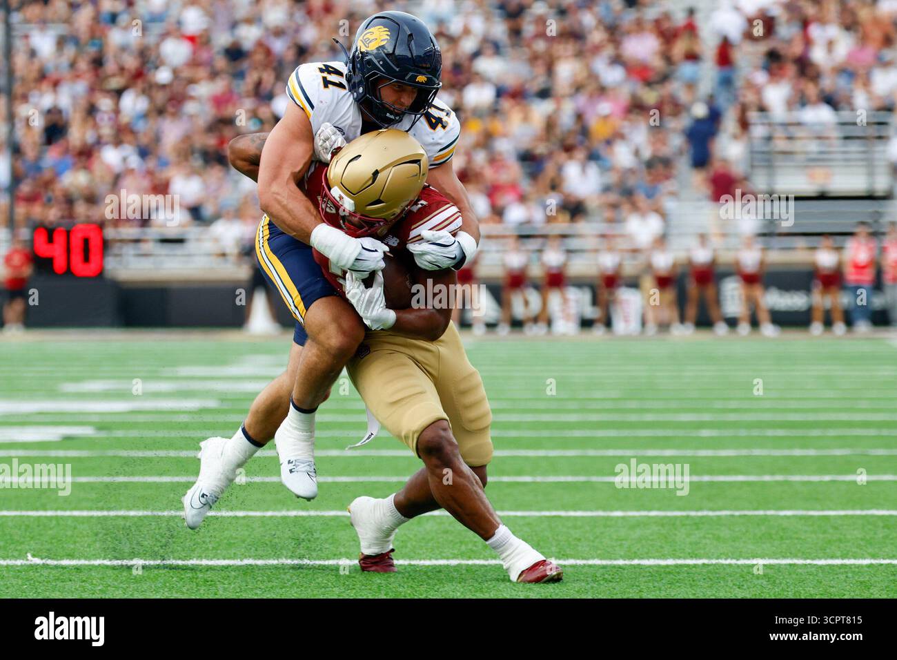 Boston College running back Turbo Richard (2) is tackled by California ...