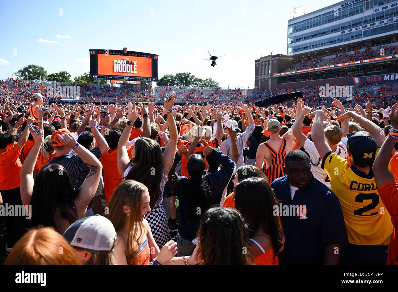 CHAMPAIGN, IL - SEPTEMBER 27: Fans rush the field following a college ...