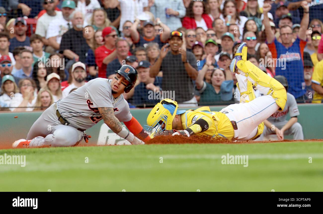 Detroit Tigers' Javier Báez (28) slides safely into home plate as ...