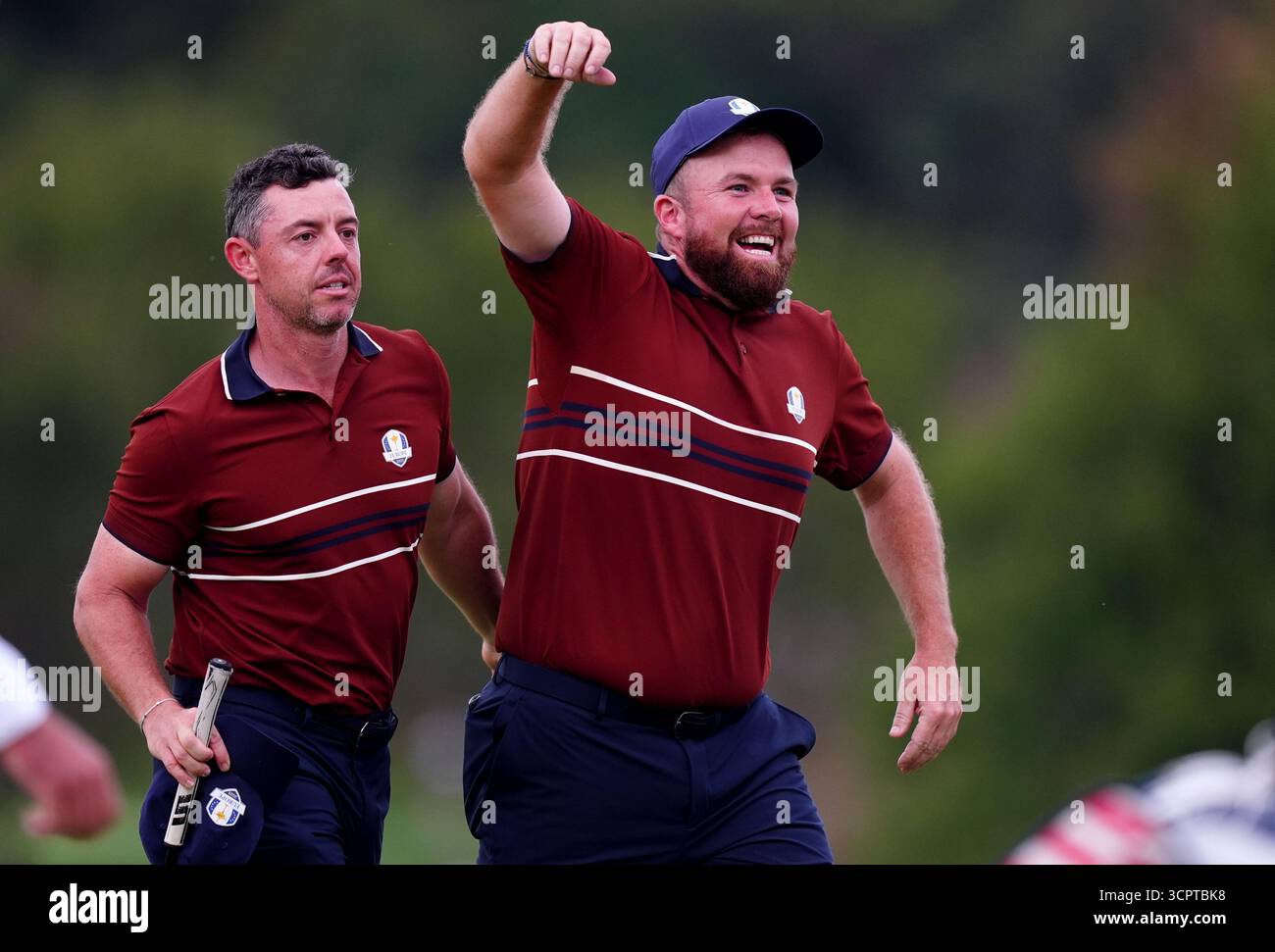 Rory McIlroy and Shane Lowry of Team Europe celebrates their victory ...