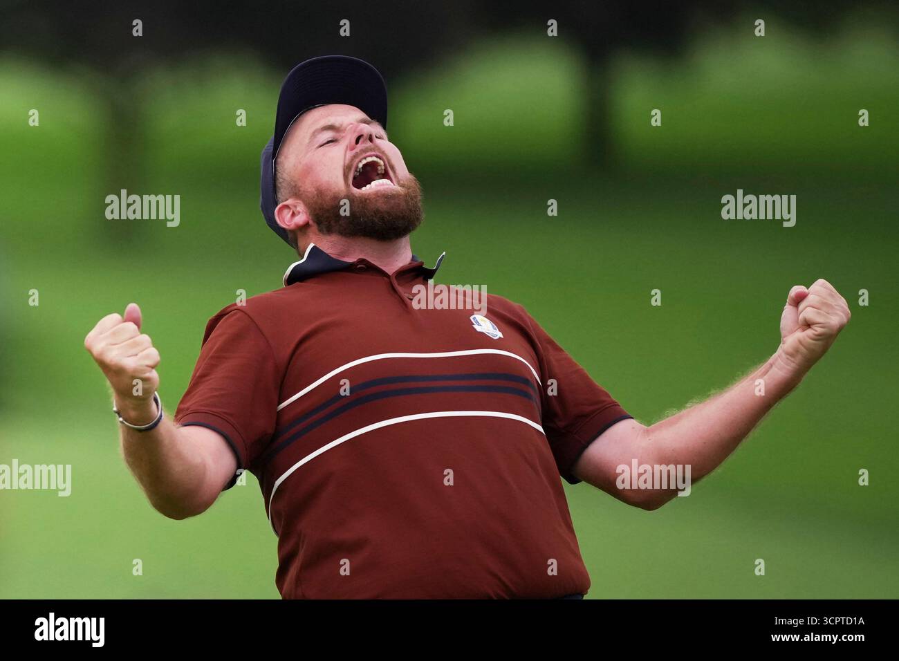 Europe's Shane Lowry react after their match win on the 18th hole at ...