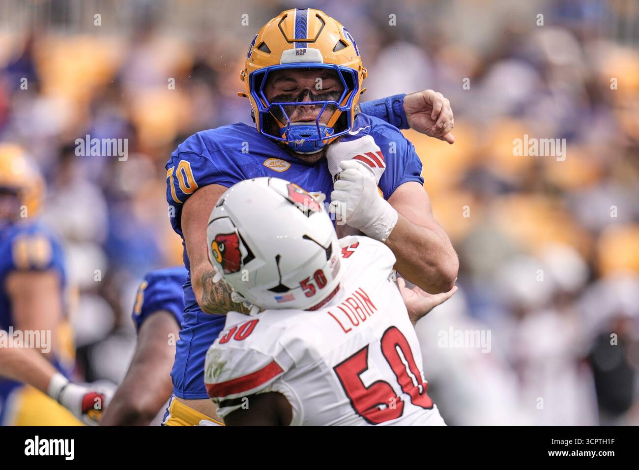 Pittsburgh offensive lineman Ryan Baer (70) blocks Louisville Cardinals ...