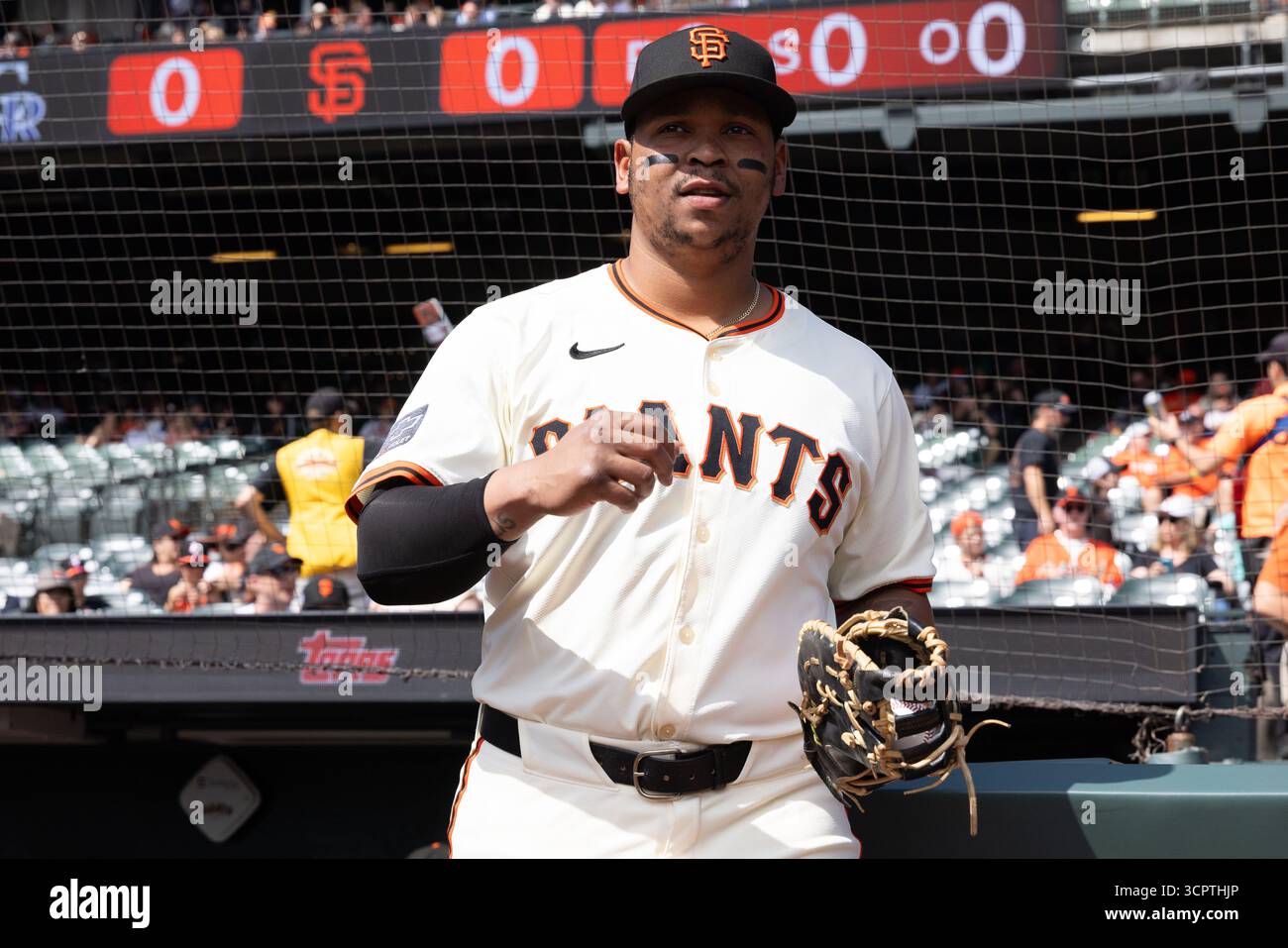 San Francisco Giants first baseman Rafael Devers walks onto the field ...
