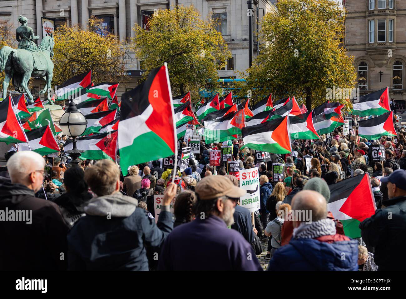 Liverpool, UK. 27 SEP, 2025. People wave Palestine flags at the ...
