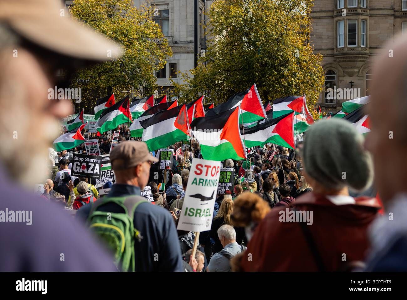 Liverpool, UK. 27 SEP, 2025. People wave Palestine flags at the ...