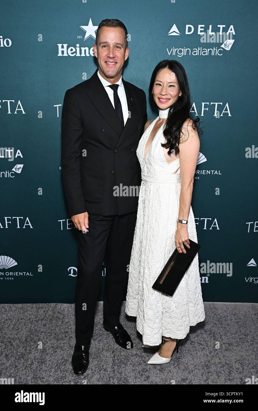Marcek Thoma, left, and Lucy Liu attend BAFTA North America's New York ...