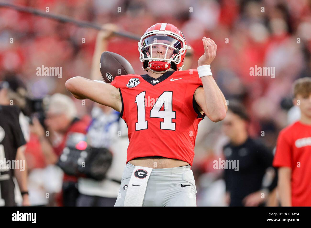 Georgia quarterback Gunner Stockton (14) warms up prior to an NCAA ...