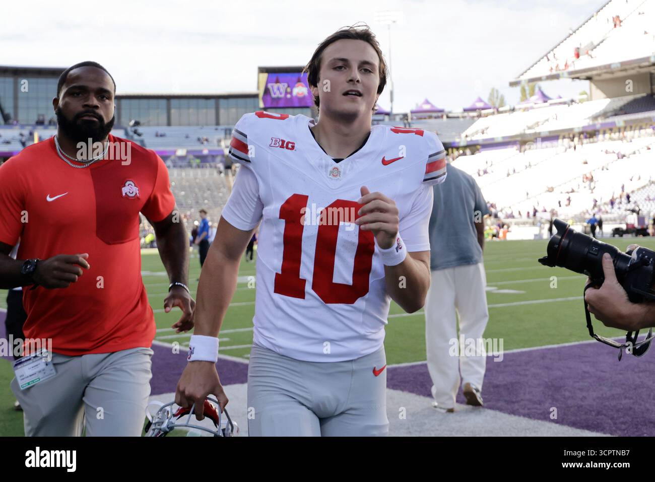 Ohio State quarterback Julian Sayin (10) runs off the field after an ...