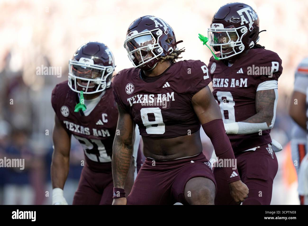 Texas A&M defensive end Cashius Howell (9) reacts after sacking Auburn ...