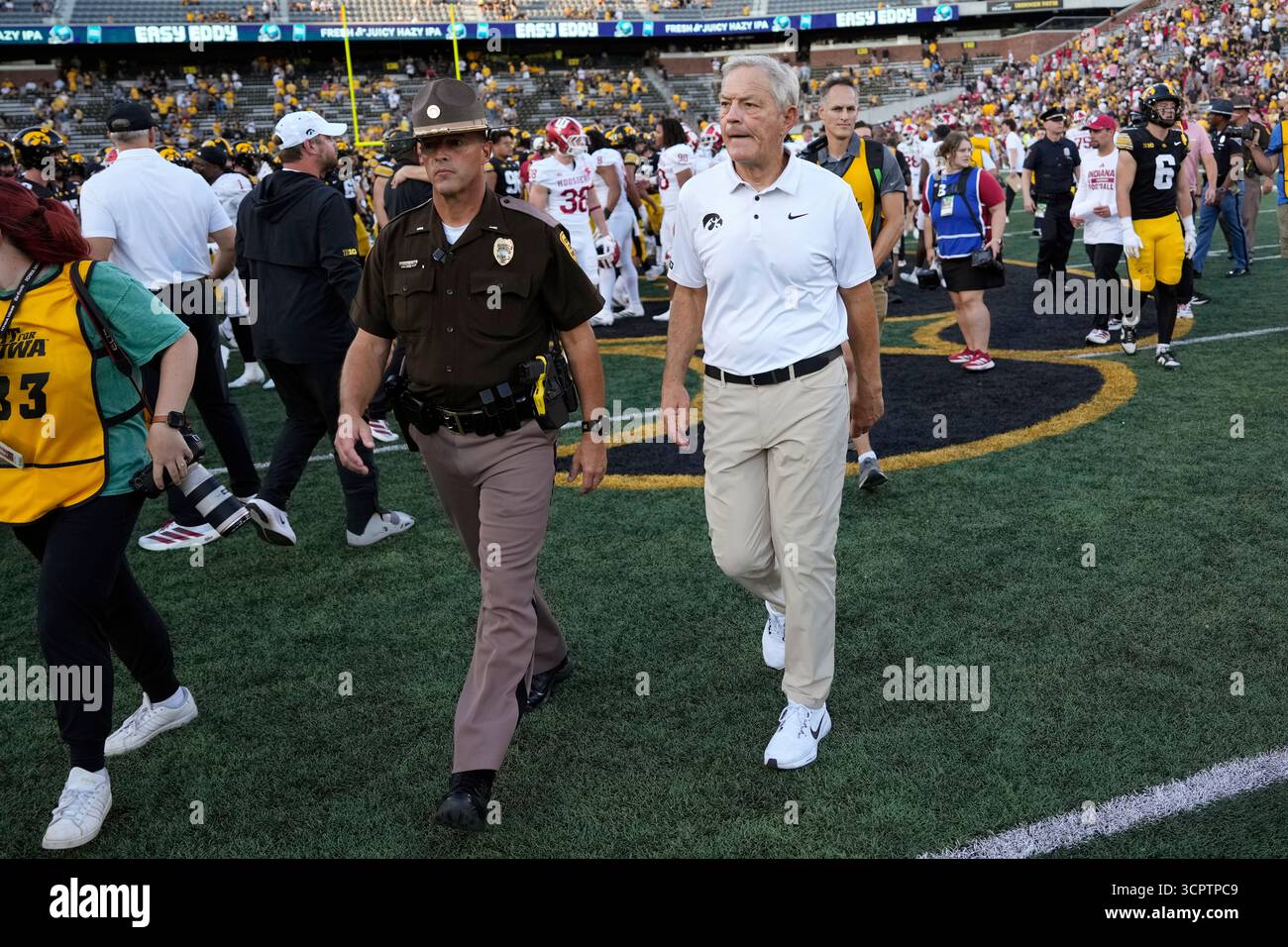 Iowa head coach Kirk Ferentz walks off the field after an NCAA college ...