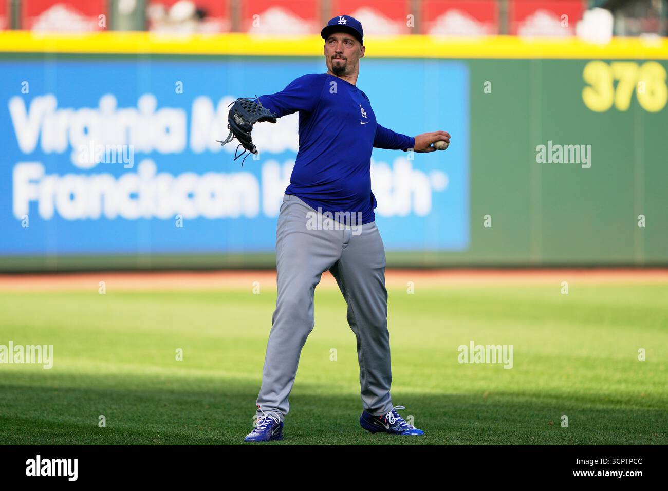 Los Angeles Dodgers starting pitcher Blake Snell warms up before a ...