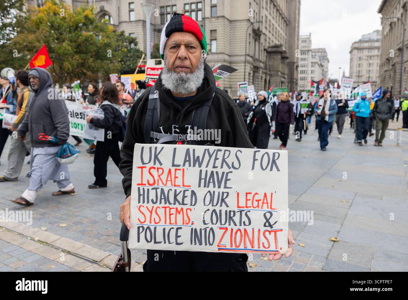 Liverpool, UK. 27 SEP, 2025. Man holds sign "UK Lawyers for Israel have ...