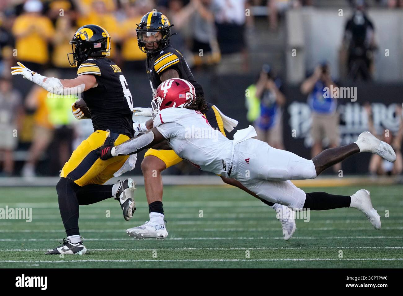 Iowa defensive back Zach Lutmer (6) runs from Indiana running back ...