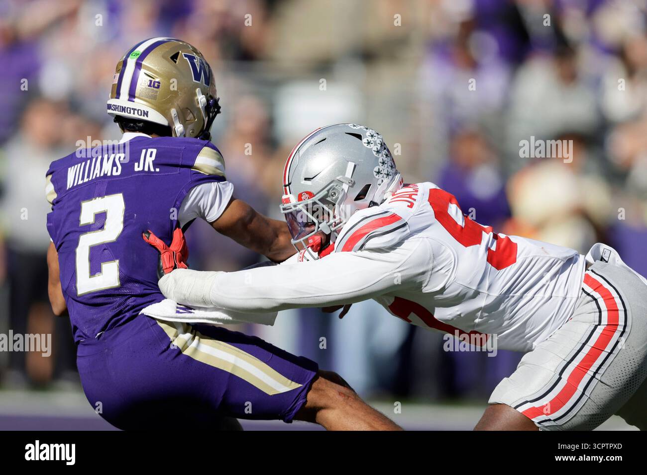 Ohio State defensive end Kenyatta Jackson Jr. (97) hits Washington ...