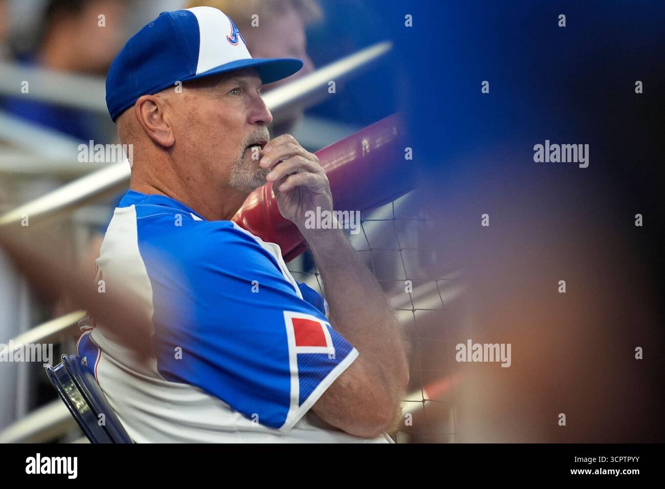 Atlanta Braves manager Brian Snitker (43) sits in the dugout in the first inning of a baseball ...