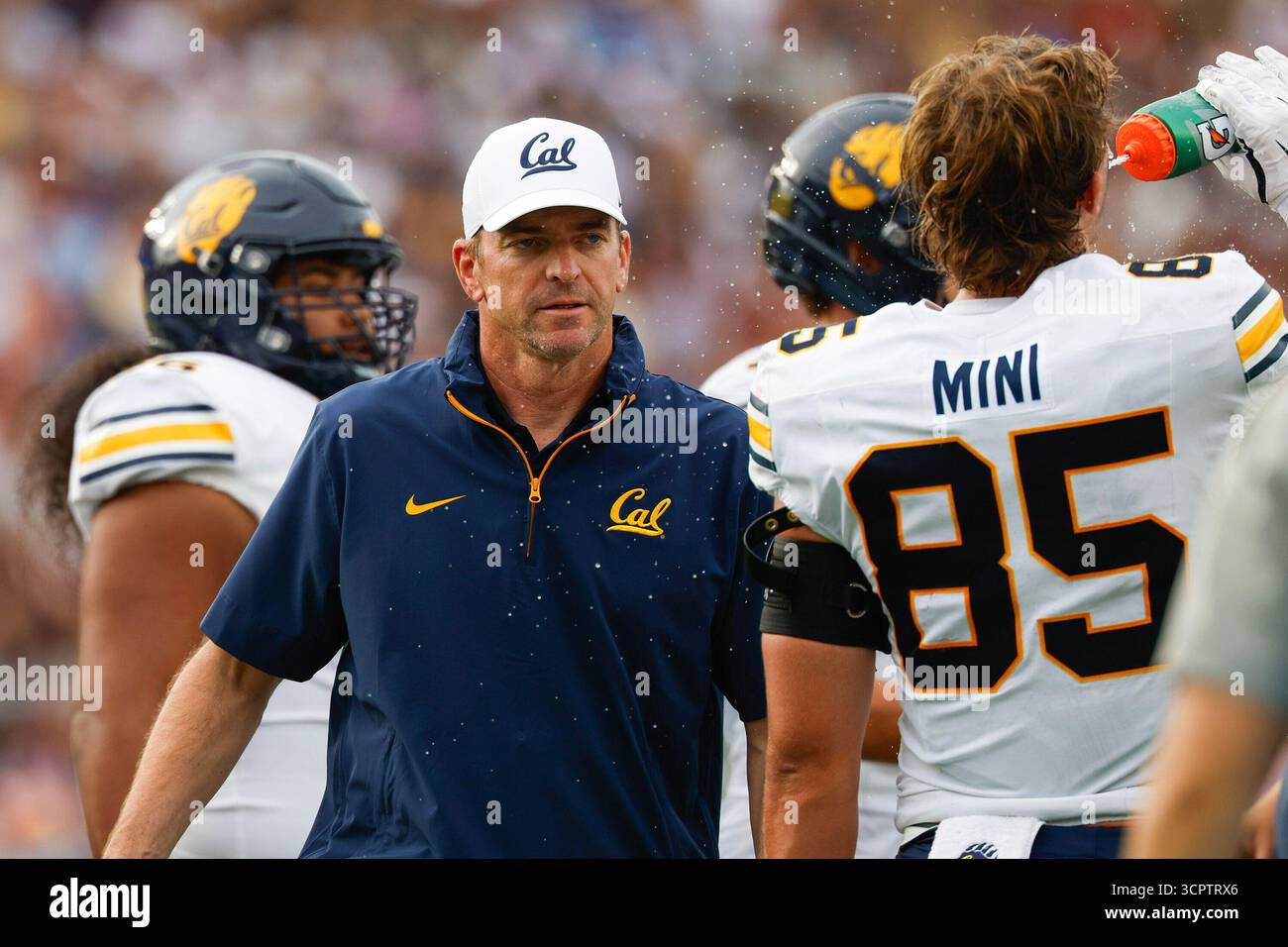 California head coach Justin Wilcox, left, talks with tight end Mason ...