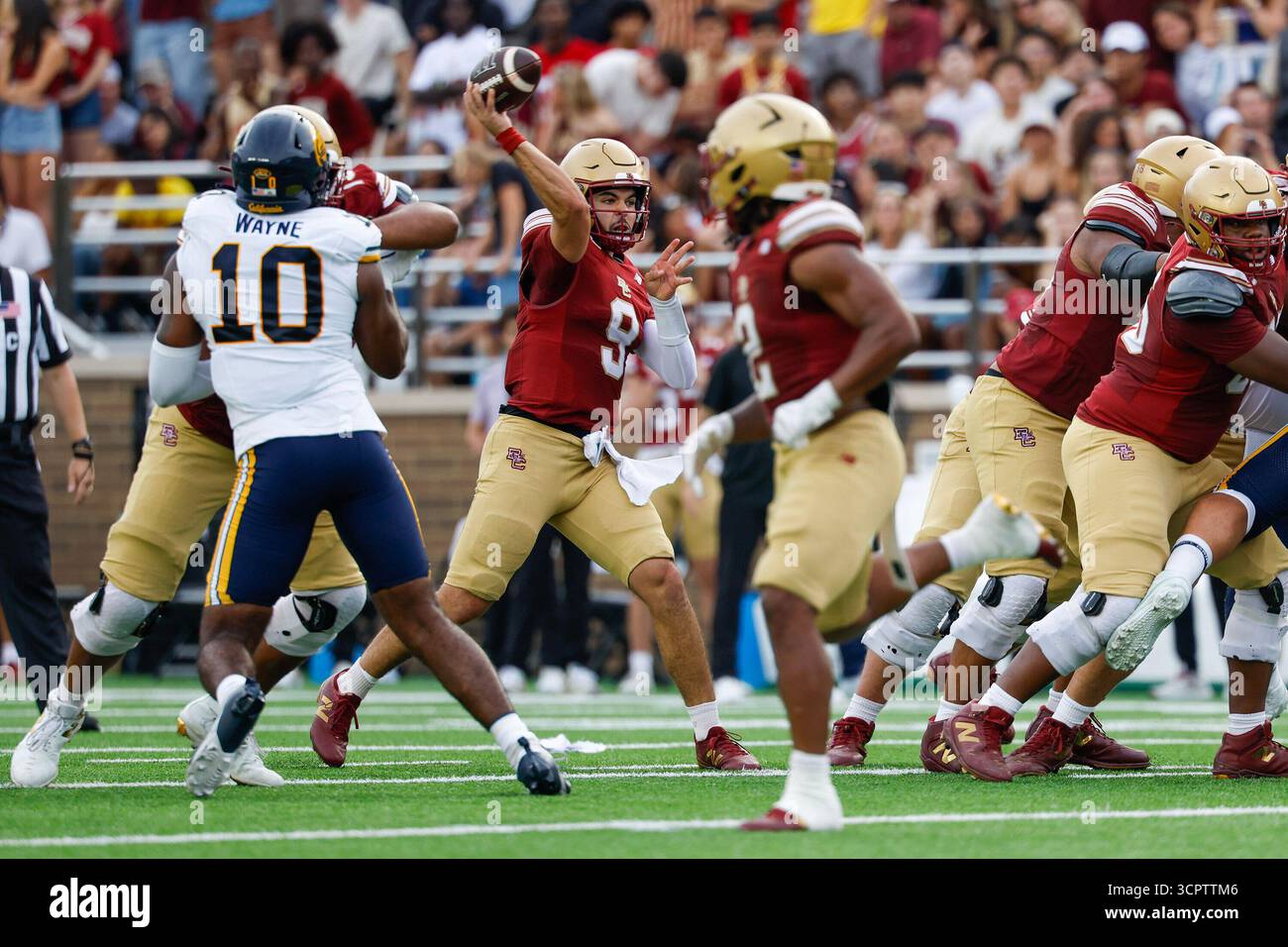 Boston College quarterback Dylan Lonergan (9) makes a pass under ...