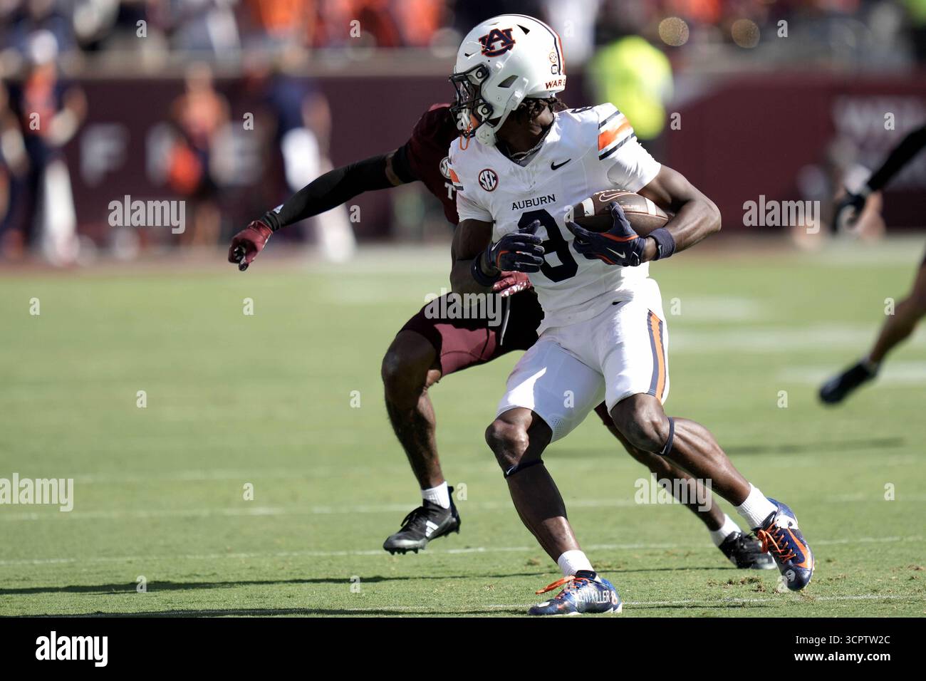 Auburn wide receiver Cam Coleman (8) turns up field after a catch ...