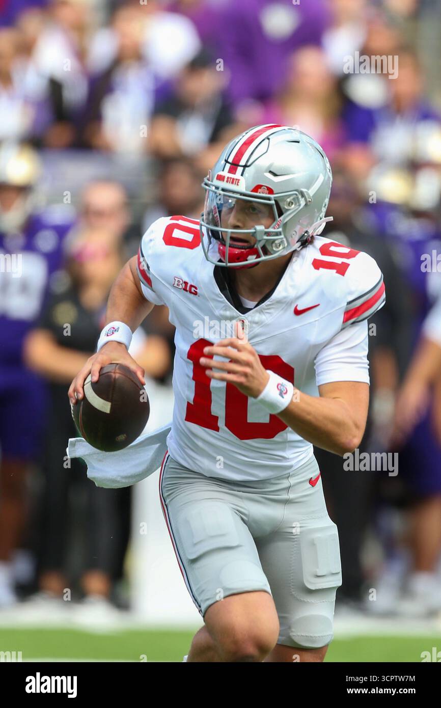 SEATTLE, WA - SEPTEMBER 27: Ohio State (GB) #10 Julian Sayin scrambles ...