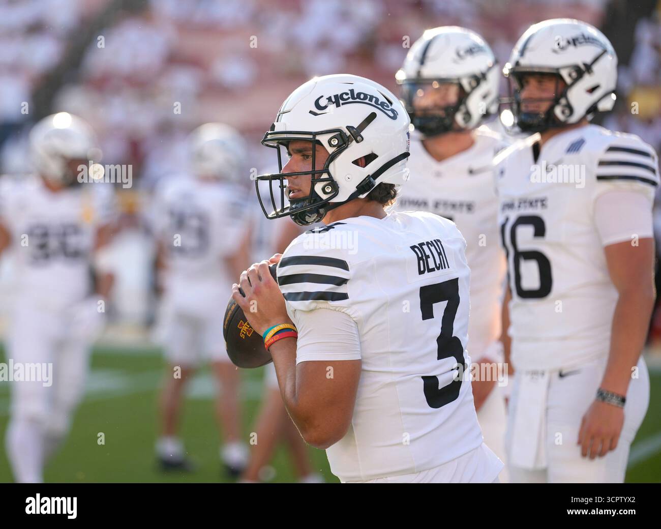 Iowa State quarterback Rocco Becht (3) warms up before an NCAA college ...