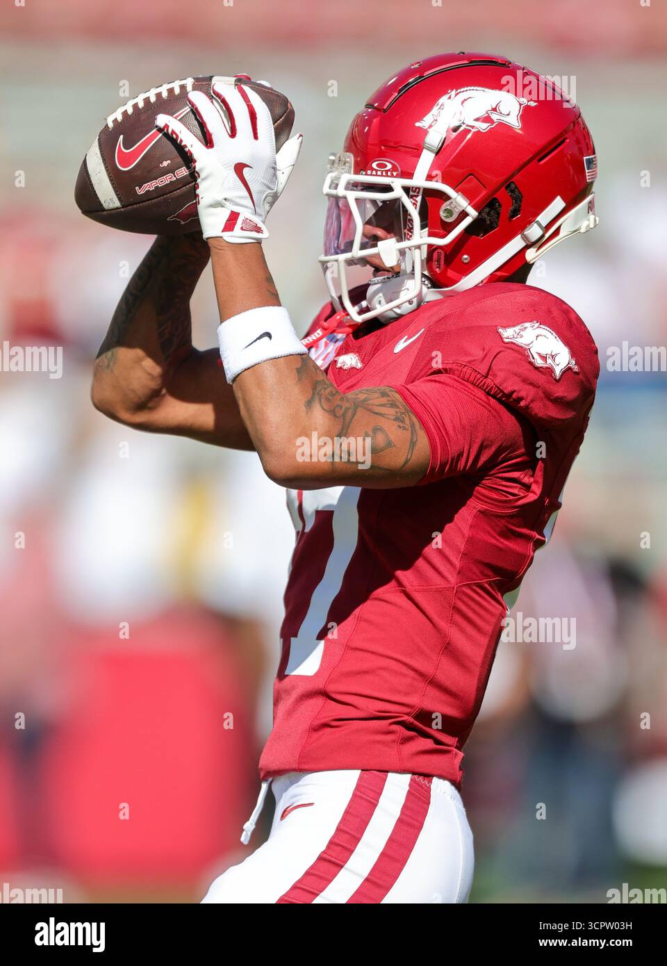 September 27, 2025: Razorback receiver Jalen Brown (17) clasp a ball ...