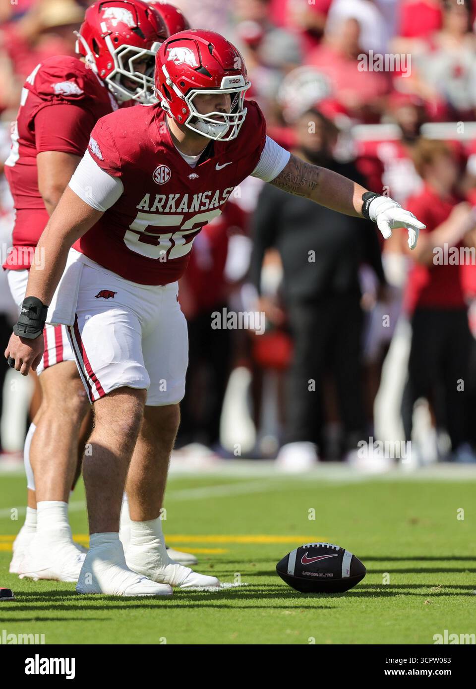 September 27, 2025: Arkansas center Caden Kitler (52) points out the ...