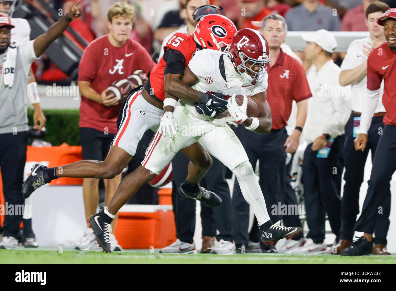 Alabama wide receiver Lotzeir Brooks (17) is tackled by Georgia ...