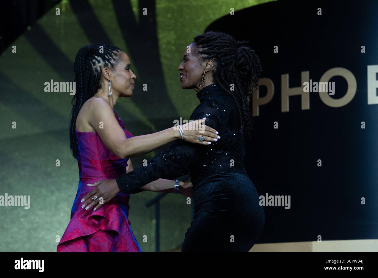 Sen. Angela Alsobrooks, D-Md., left, presents the Congressional Black ...
